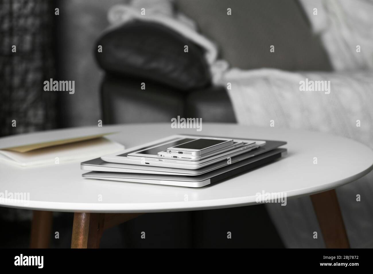 Pile of electronic gadgets on the table. Communication and technology ...