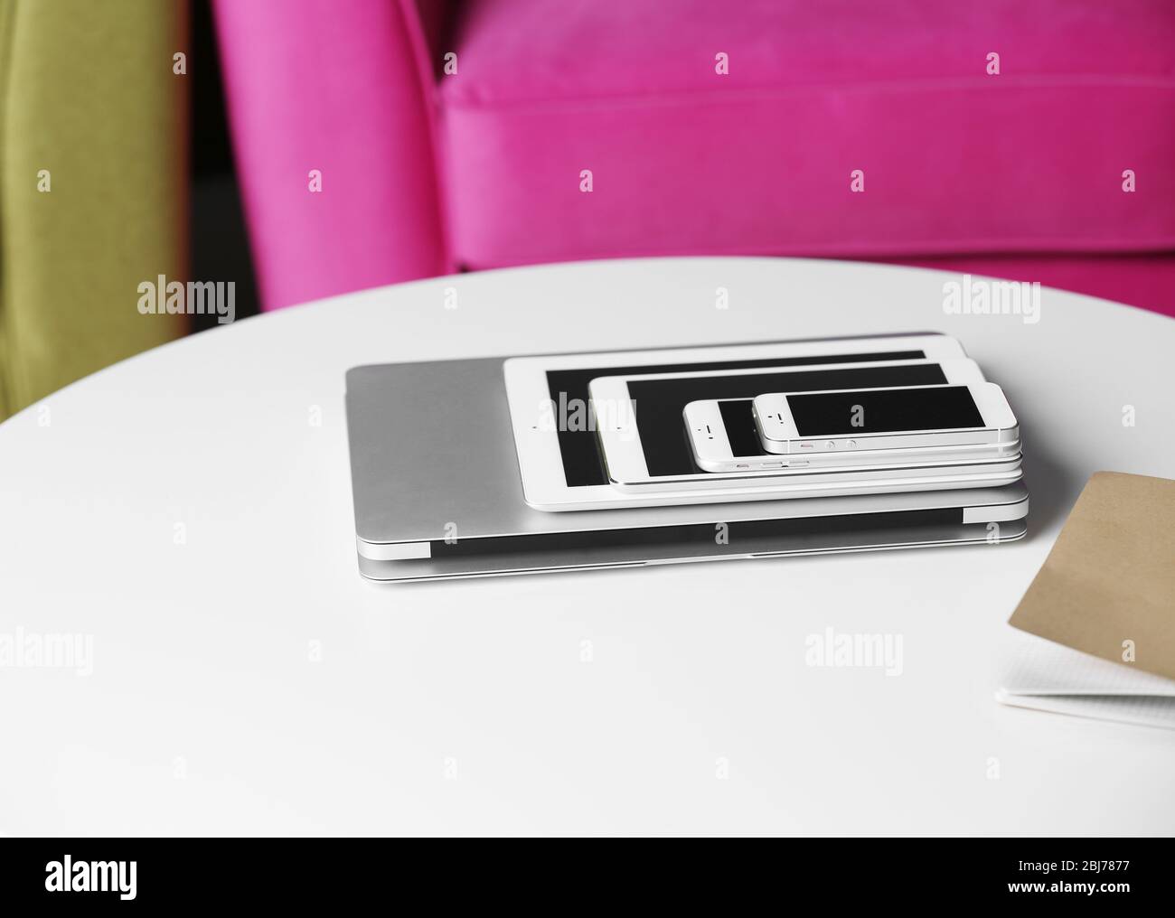 Pile of electronic gadgets on the table. Communication and technology ...