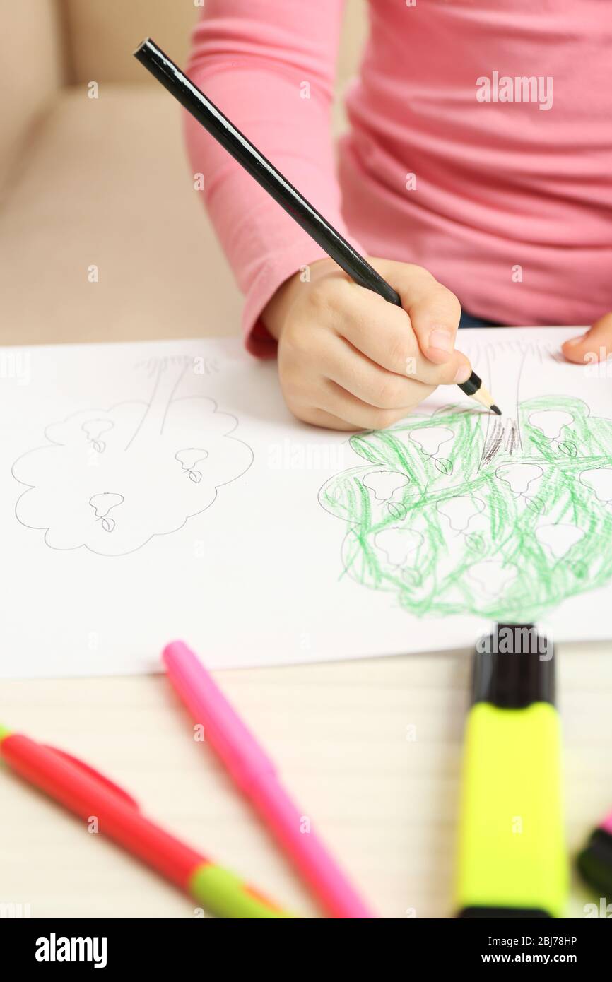 Child drawing tree with pencils on paper, closeup Stock Photo - Alamy