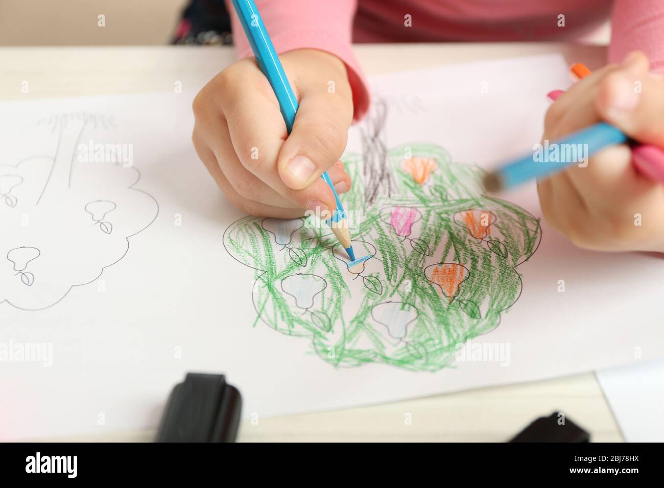 Child drawing tree with pencils on paper, closeup Stock Photo - Alamy