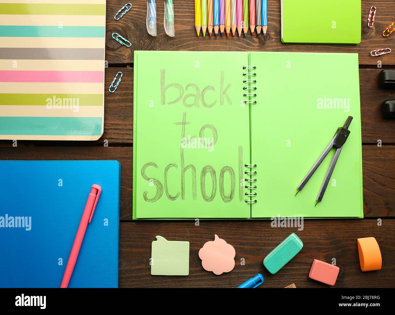 School set with back to school inscription in notebook and stationery ...