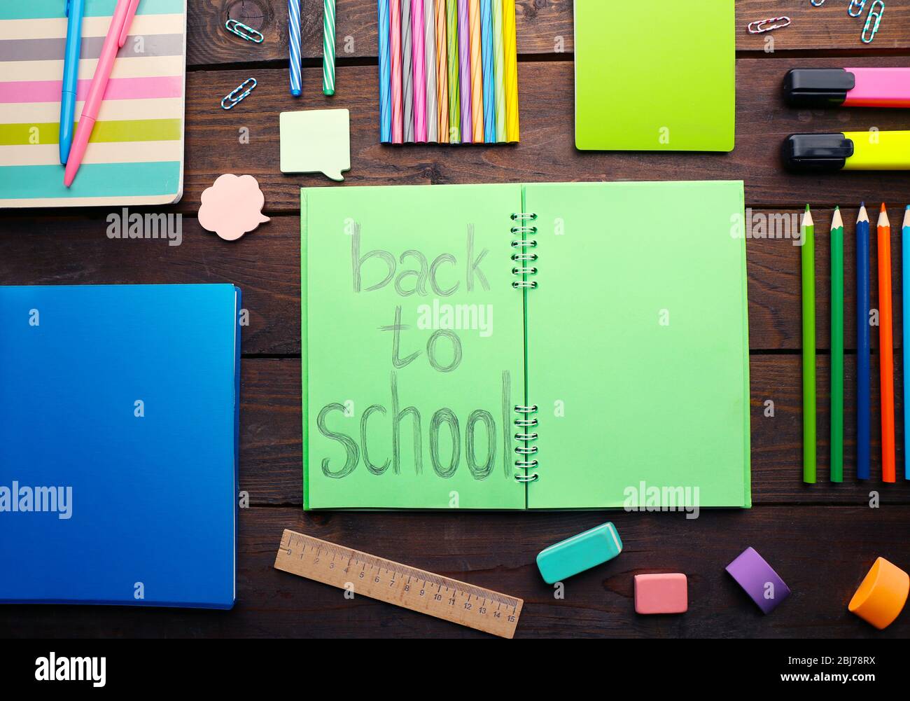 School set with back to school inscription in notebook and stationery ...