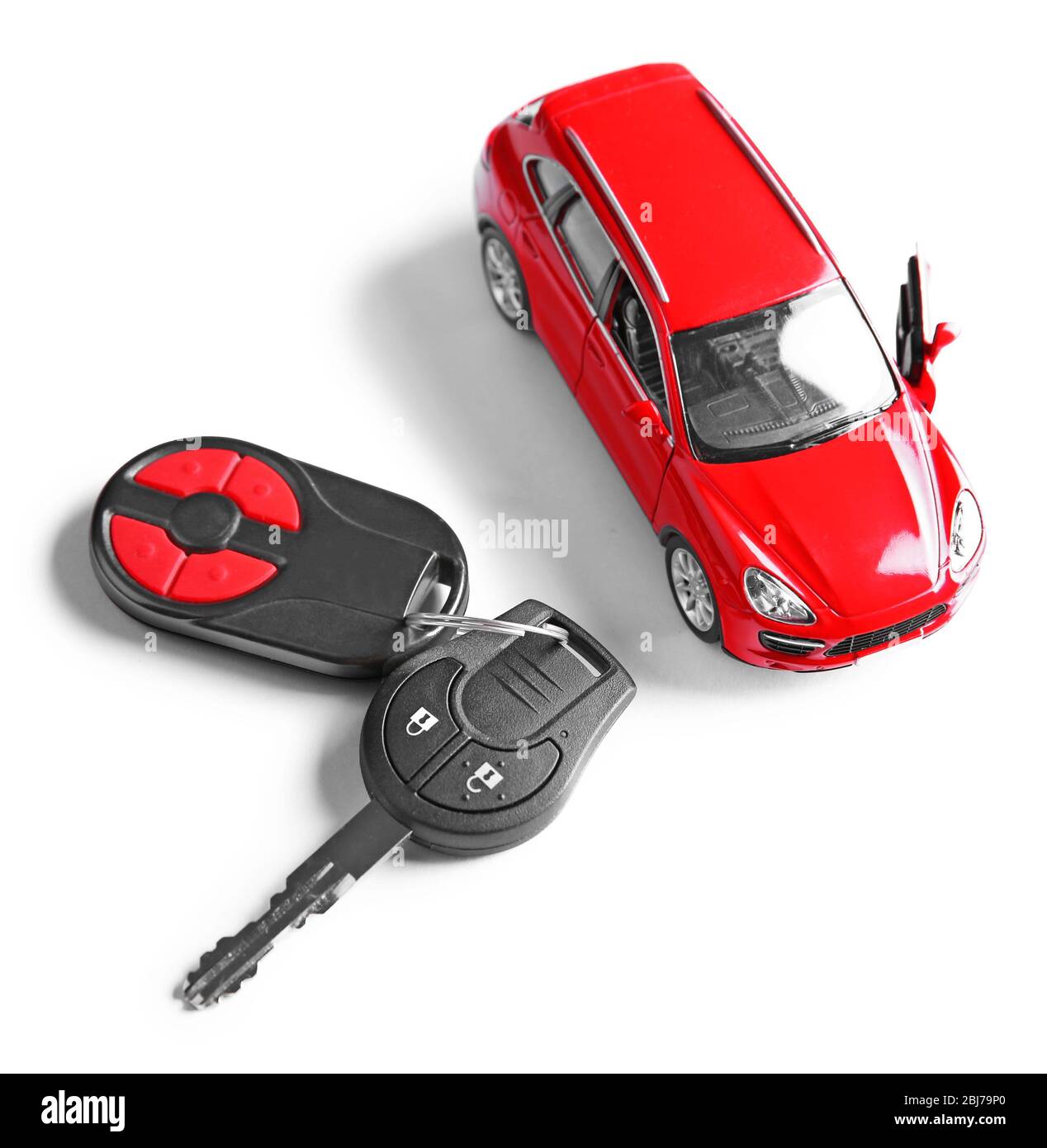 New red car with keys, isolated on white Stock Photo - Alamy