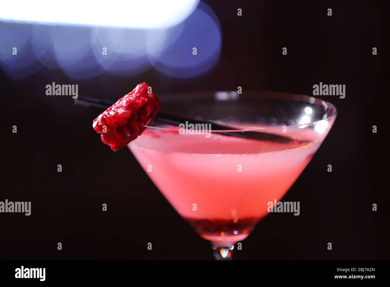 Glass of cocktail on bar background Stock Photo - Alamy