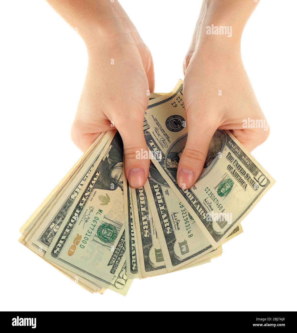 Fan of money in female hands isolated on white Stock Photo - Alamy
