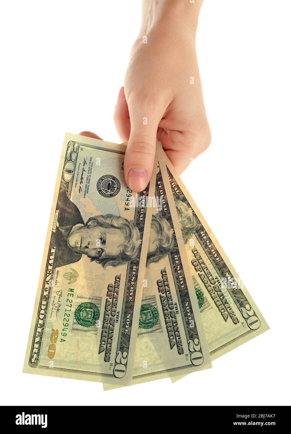 Fan of money in female hand isolated on white Stock Photo - Alamy