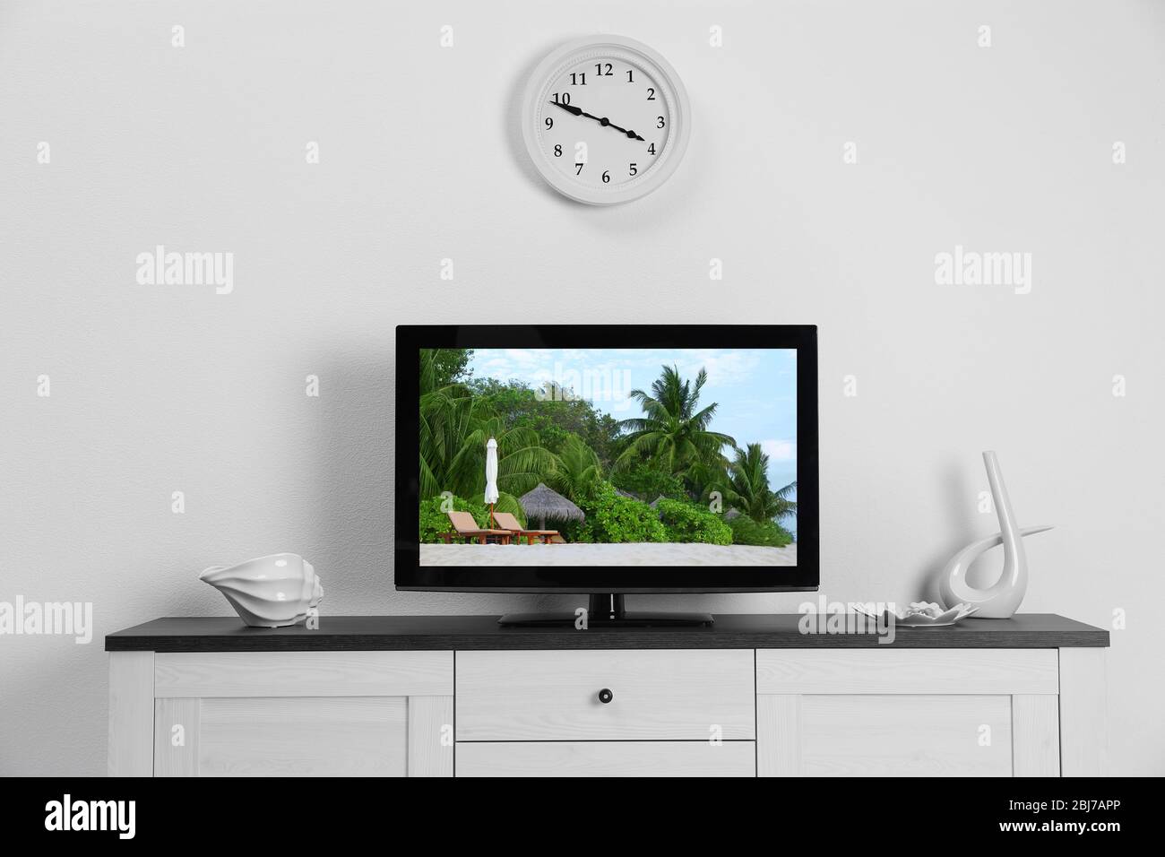 TV set in the interior of light room Stock Photo - Alamy