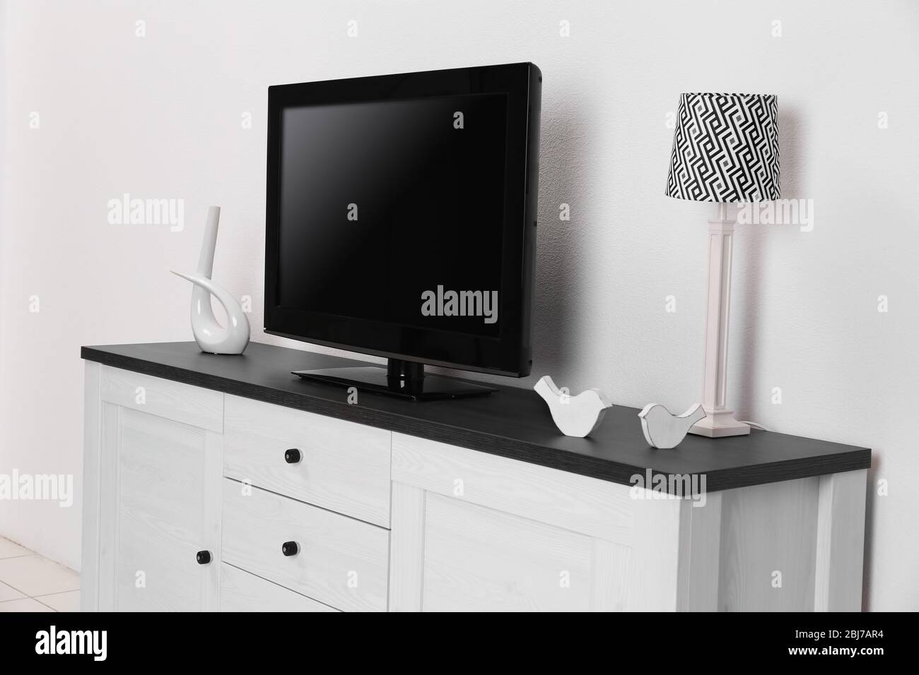 TV set in the interior of light room Stock Photo - Alamy