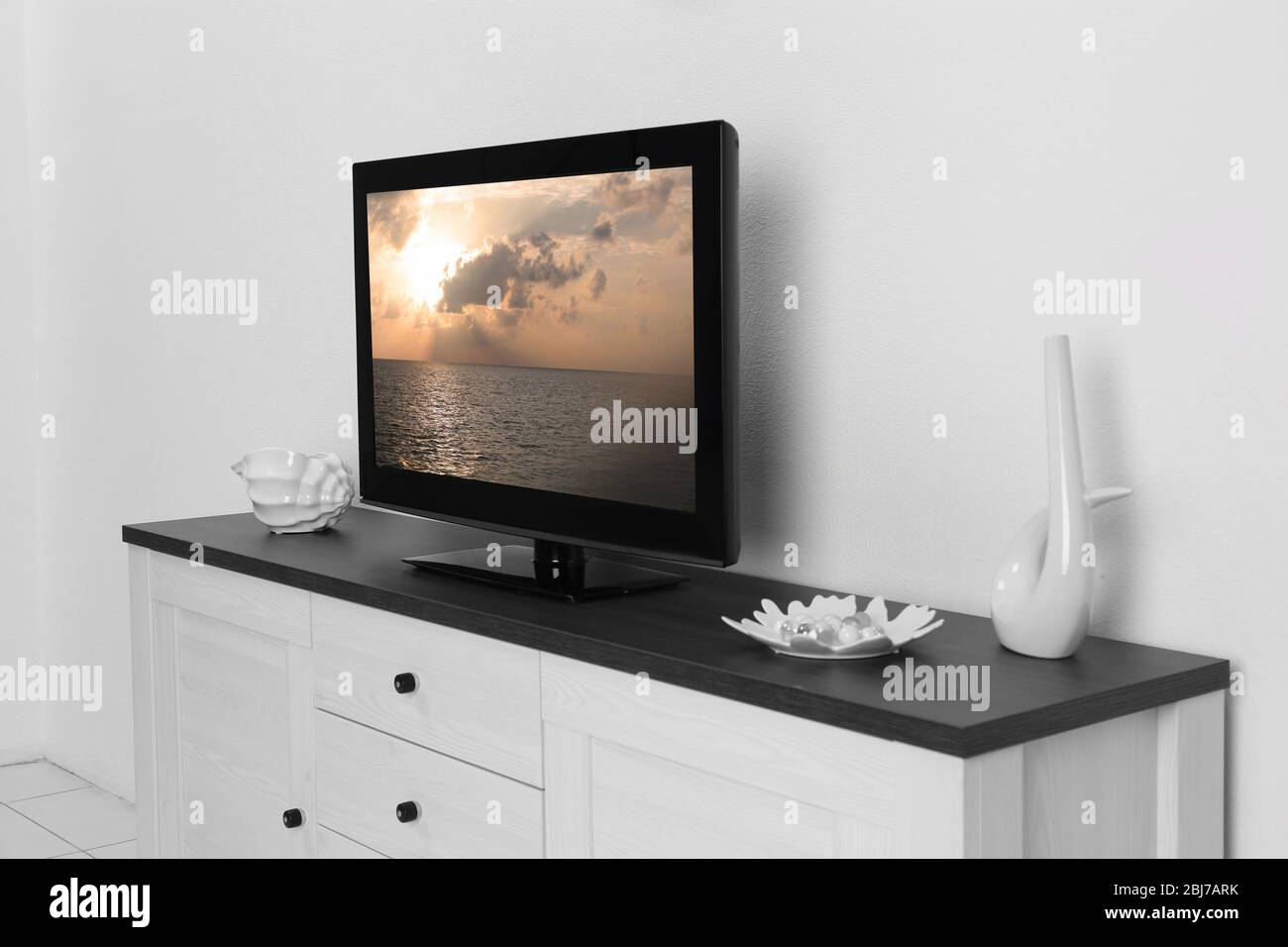 TV set in the interior of light room Stock Photo - Alamy