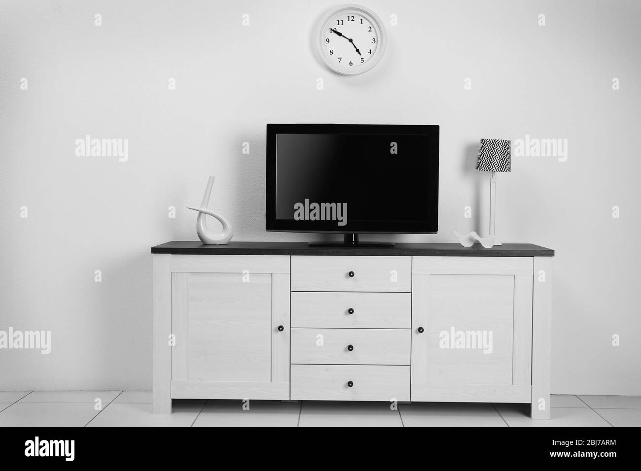 TV set in the interior of light room Stock Photo - Alamy