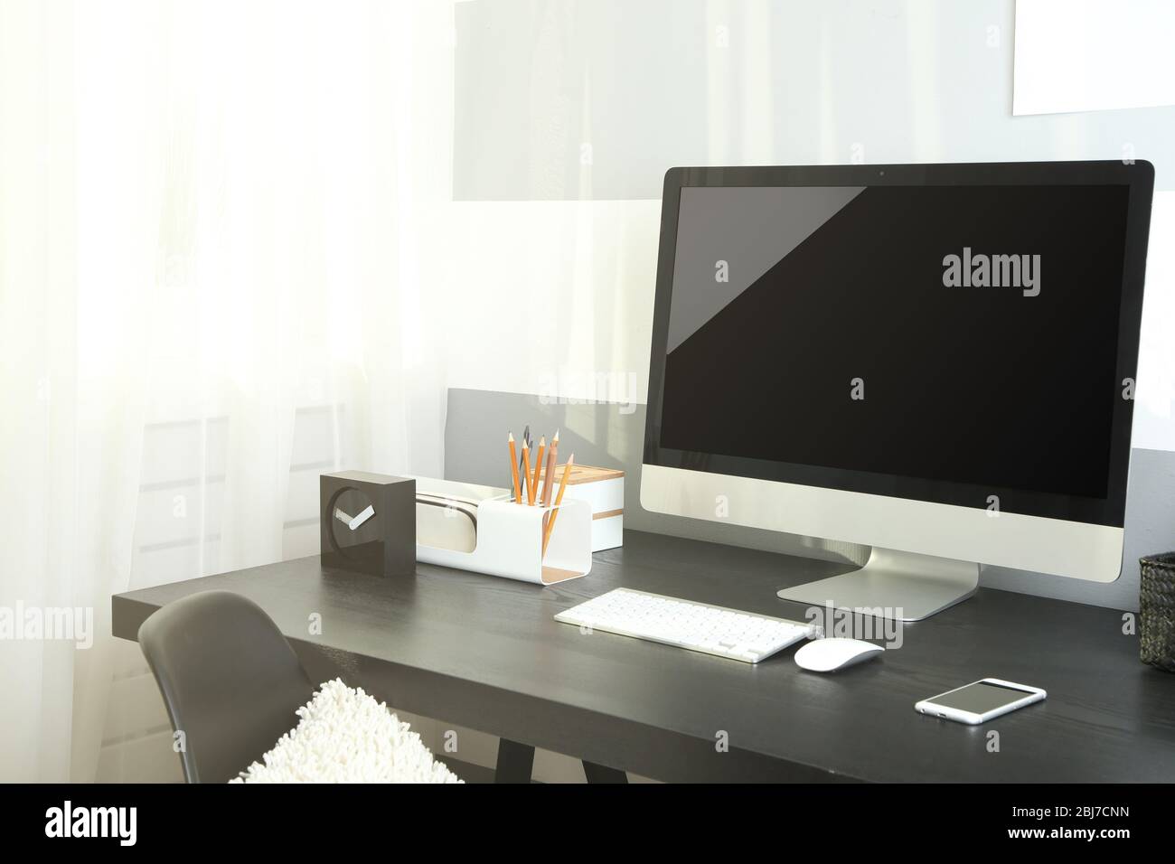 Comfortable workplace with modern computer Stock Photo - Alamy