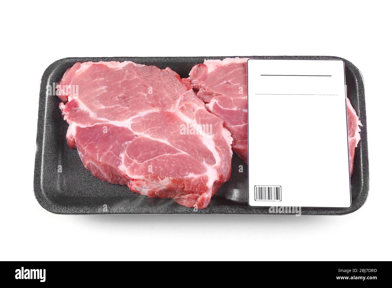 Packed pieces of pork meat, isolated on white Stock Photo - Alamy