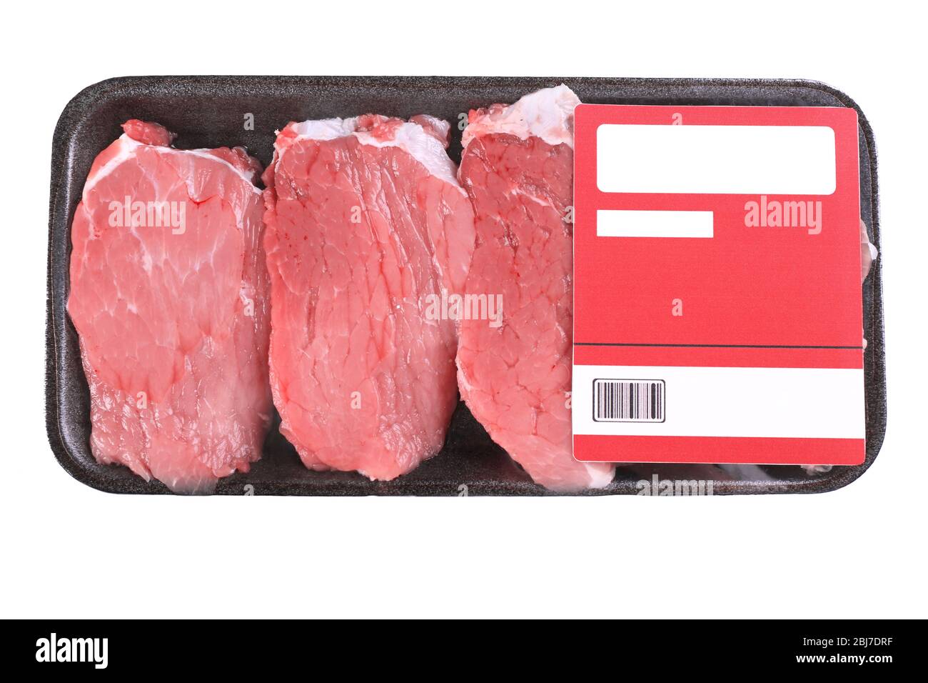 Packed pieces of beef meat, isolated on white Stock Photo - Alamy