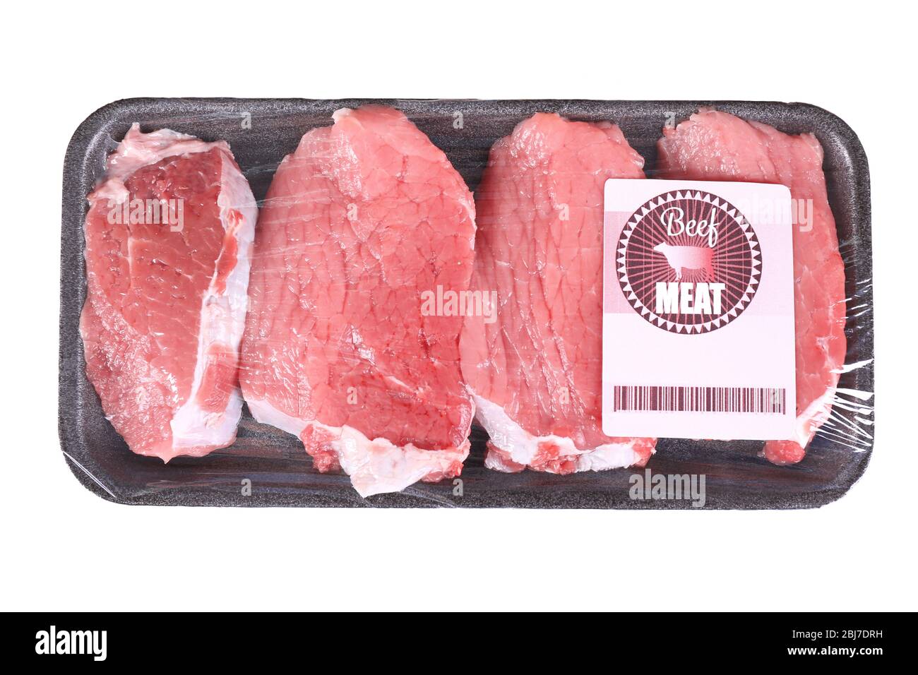 Packed pieces of beef meat, isolated on white Stock Photo - Alamy