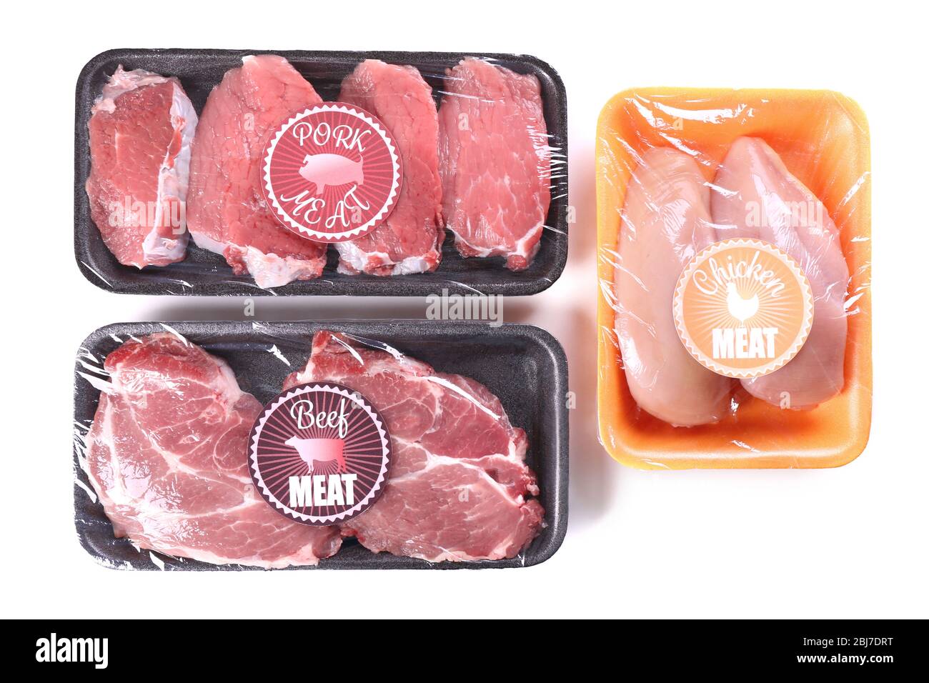 Packed pieces of chicken, pork and beef meat, isolated on white Stock ...