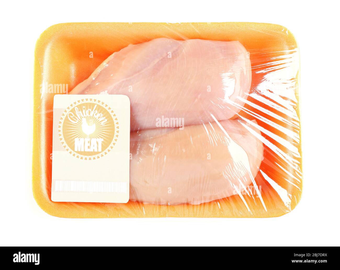 Packed pieces of chicken meat, isolated on white Stock Photo - Alamy