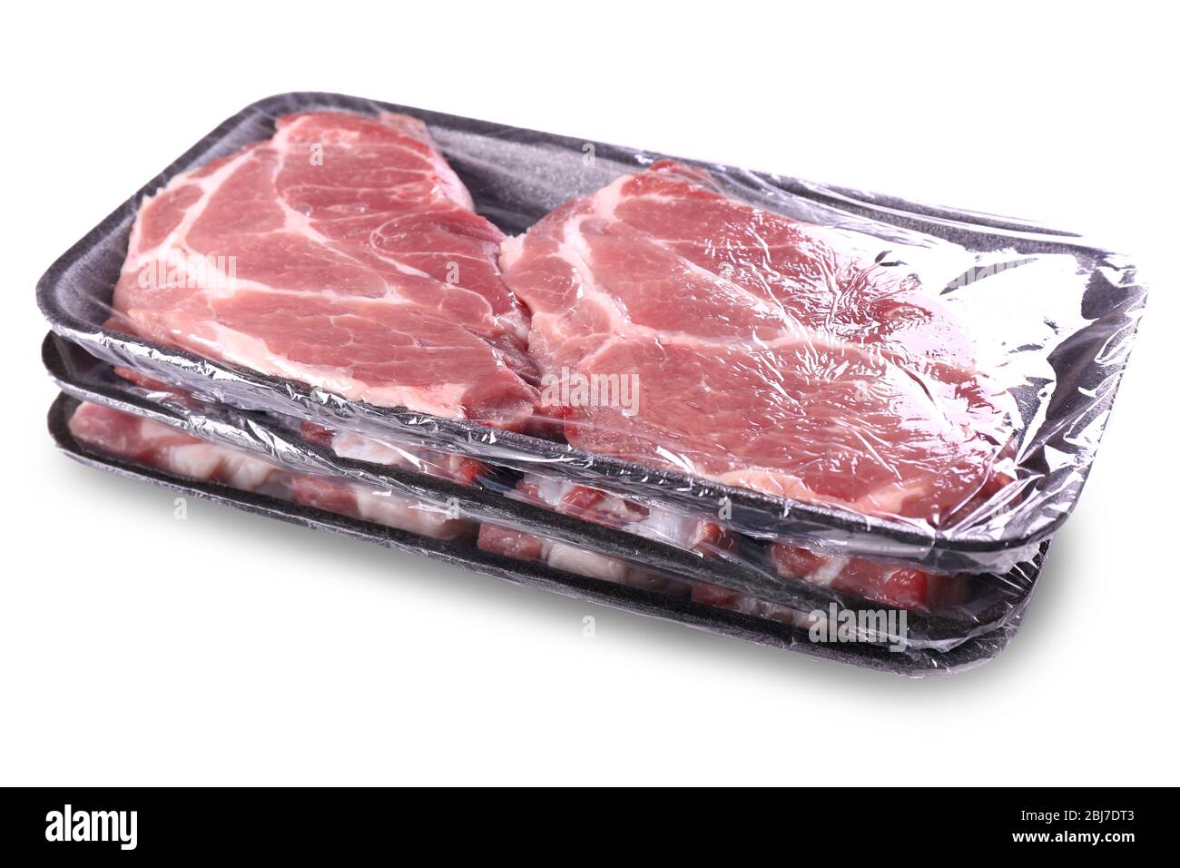 Stack of packed pork meat, isolated on white Stock Photo - Alamy