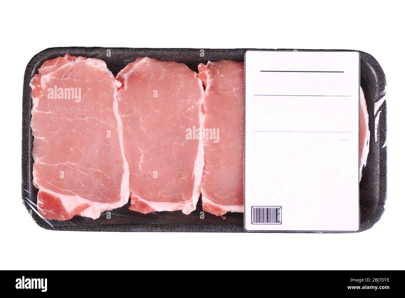 Packed pieces of pork meat, isolated on white Stock Photo - Alamy
