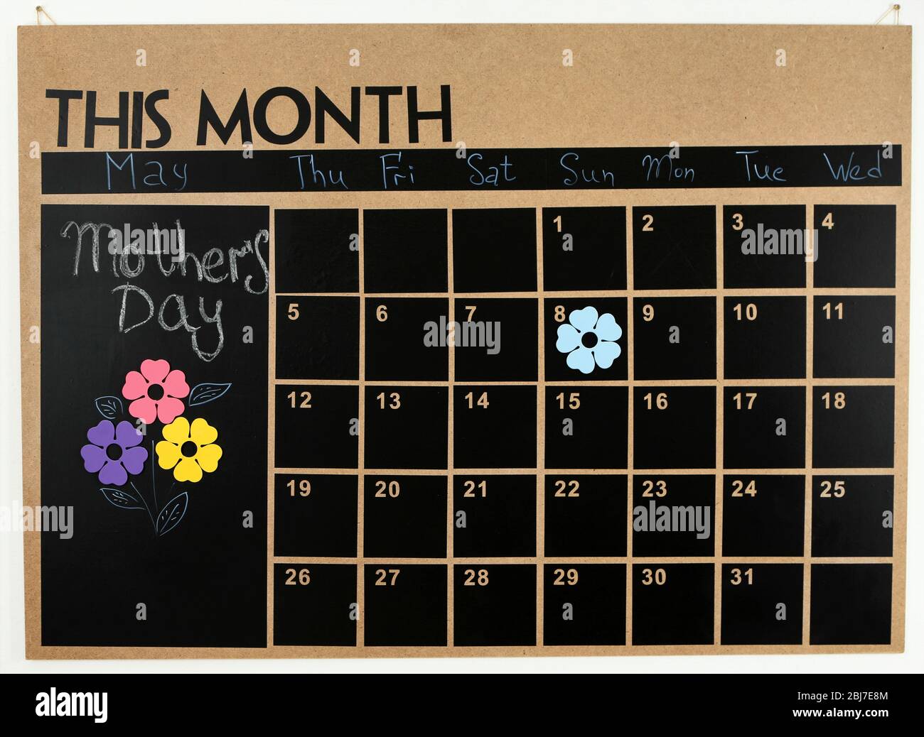 Chalkboard wall calendar with mark on 8 May Stock Photo - Alamy