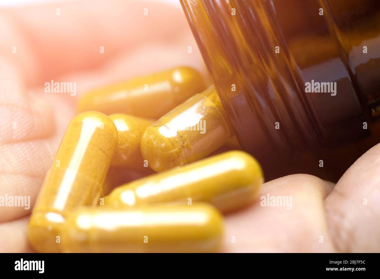 Cumin powder in transparent hard gelatin capsule. Herbal medicine ...