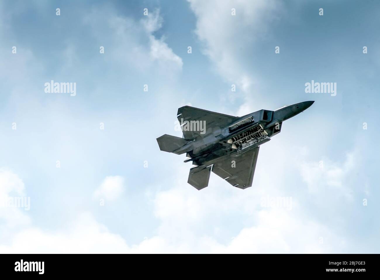 A fighter jet does a flyover in the USA Stock Photo - Alamy