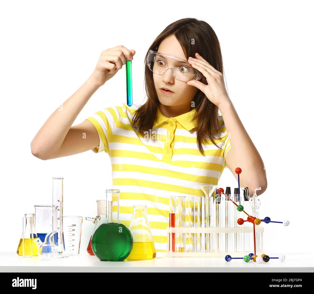 Beautiful girl with chemical flasks and test-tubes isolated on white ...