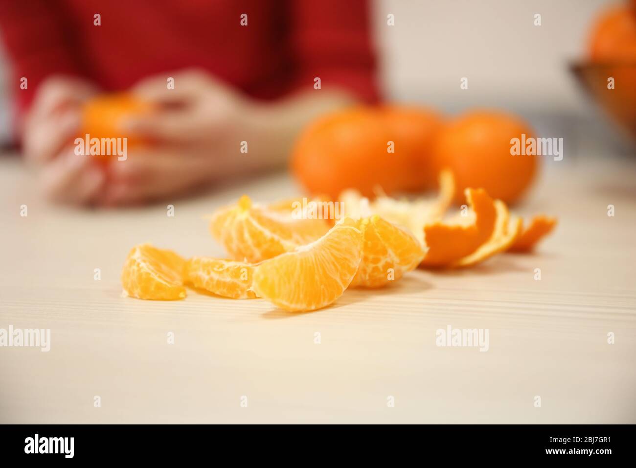 Peeling a tangerine hi-res stock photography and images - Alamy