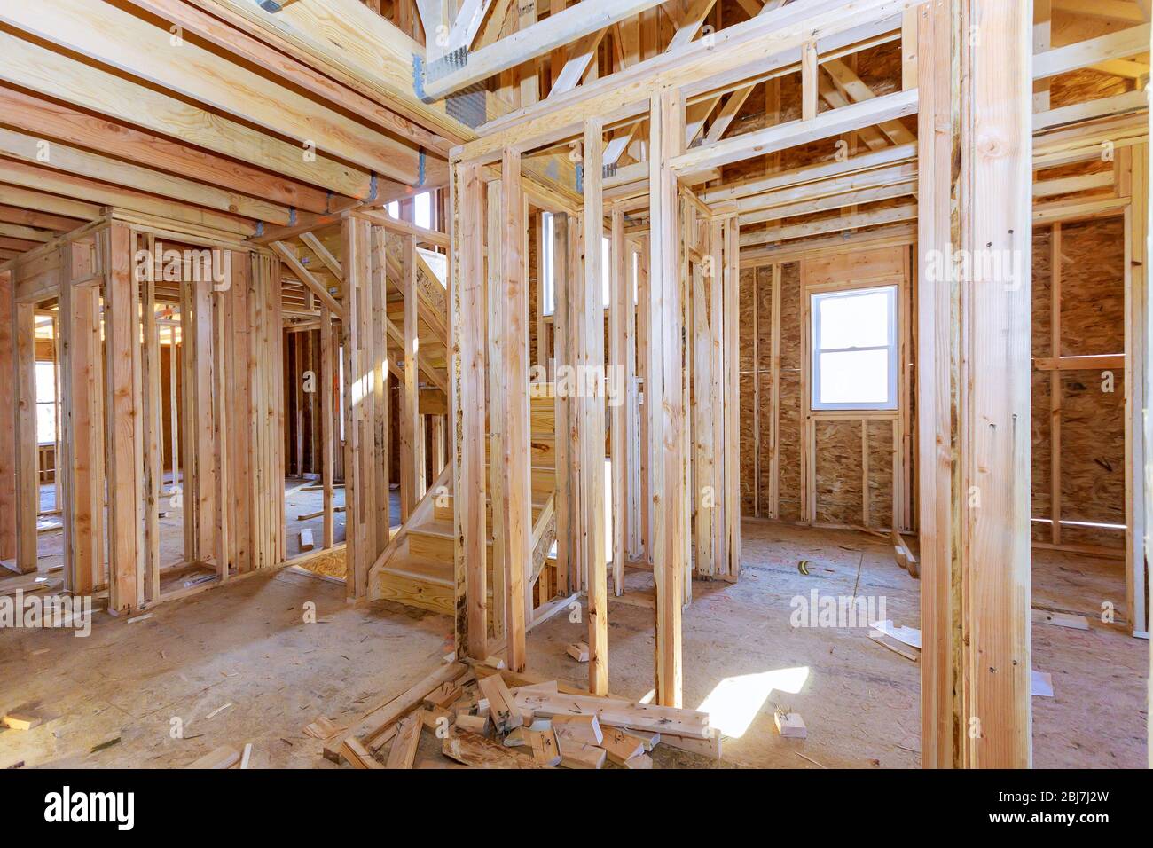 Wooden house building frame structure on a new development framing of ...