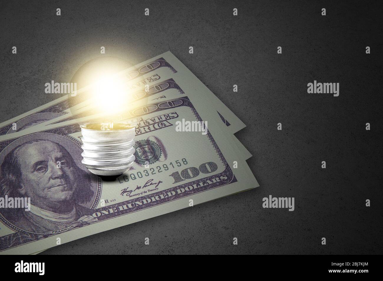 Lightbulb on money dollar currency, financial and profit of economic ...