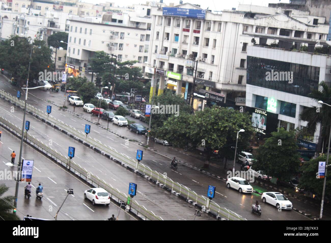Top view of a developed city road traffic with vehicle, Indian town ...