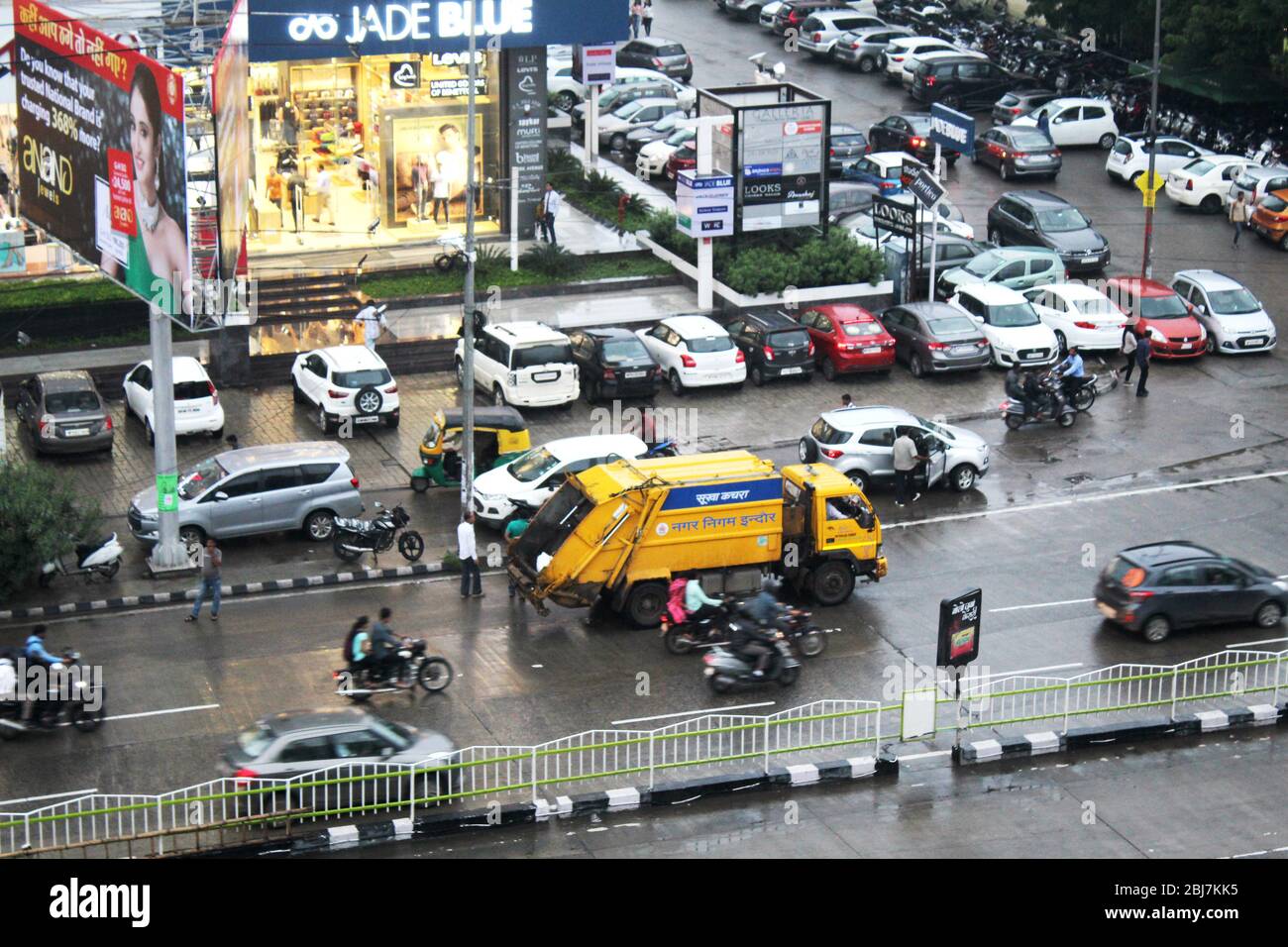 Top view of a developed city road traffic with vehicle, Indian town ...
