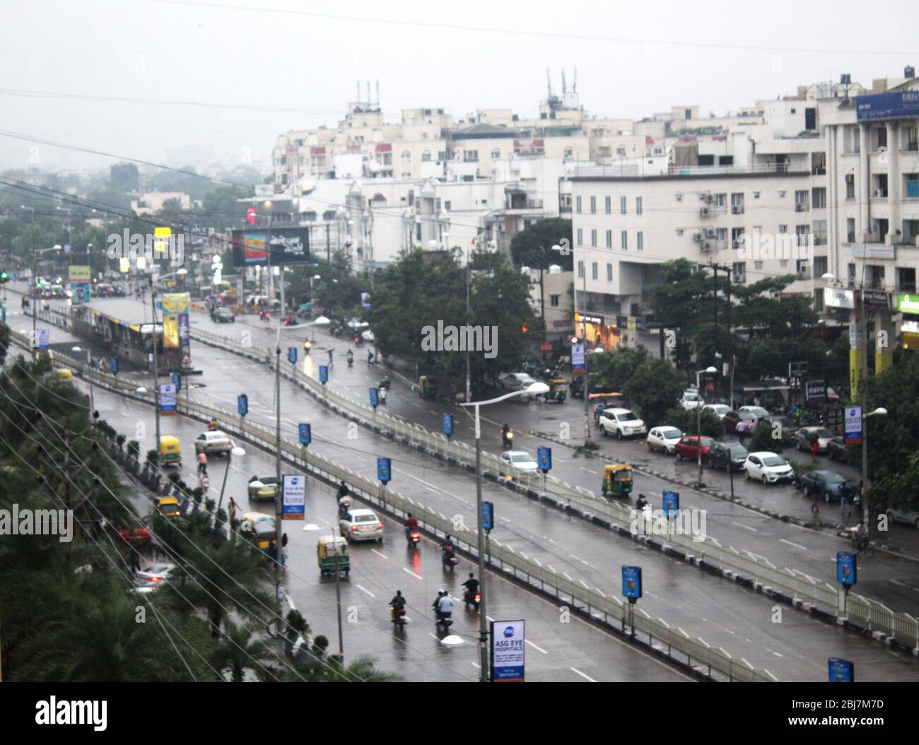 Top view of a developed city road traffic with vehicle, Indian town ...