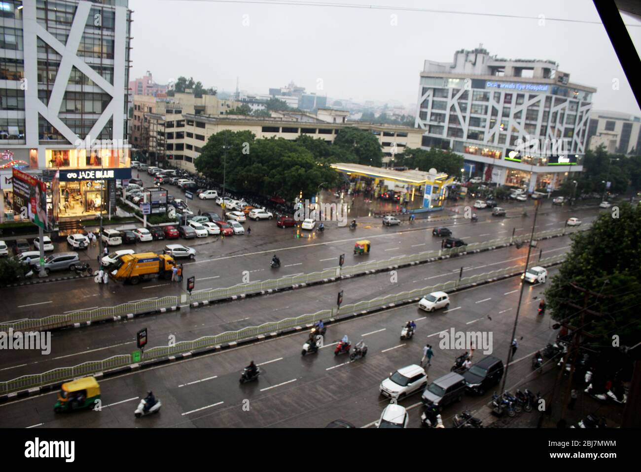 Top view of a developed city road traffic with vehicle, Indian town ...
