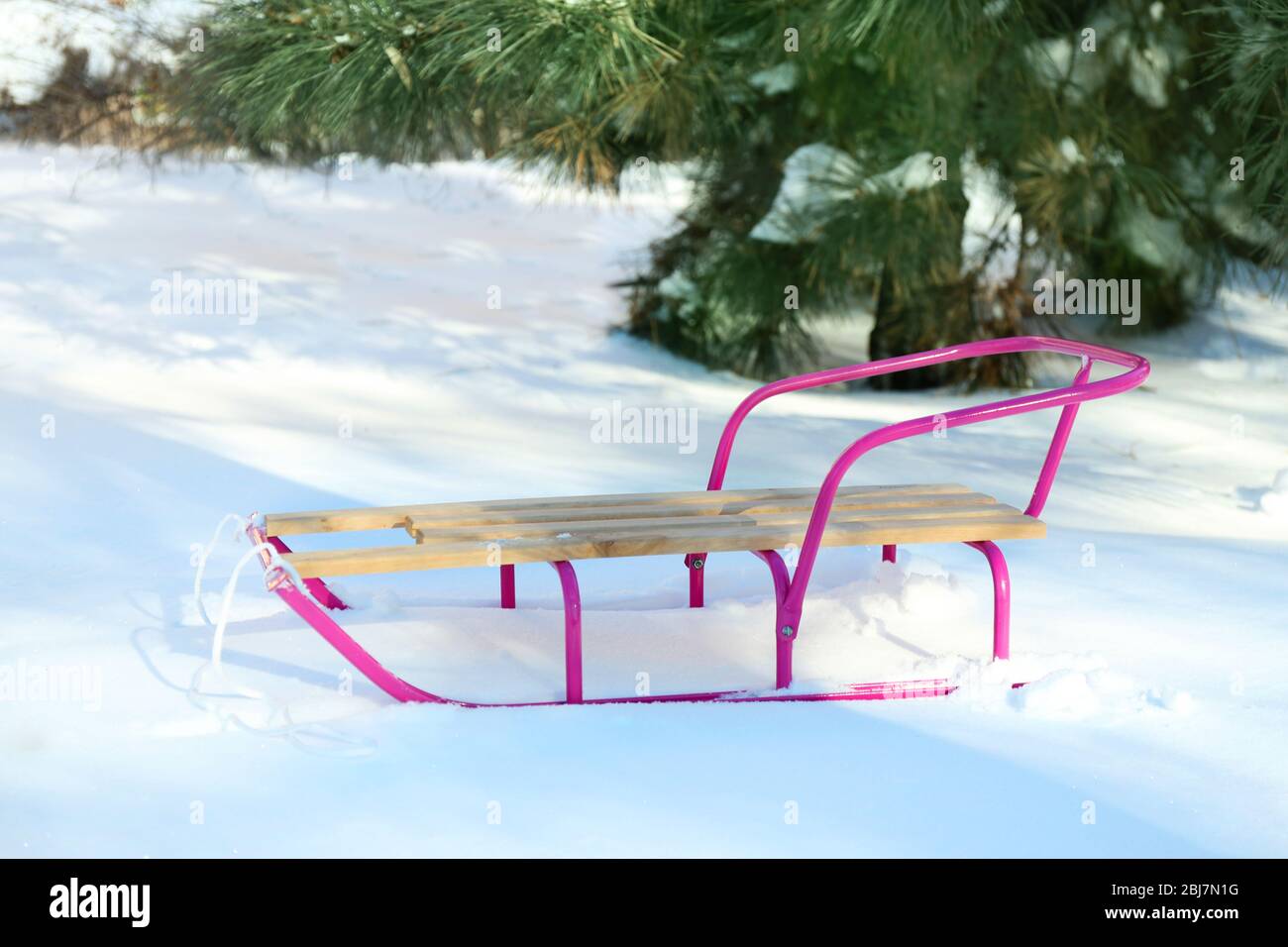 Wooden sled on snow, outdoor Stock Photo - Alamy