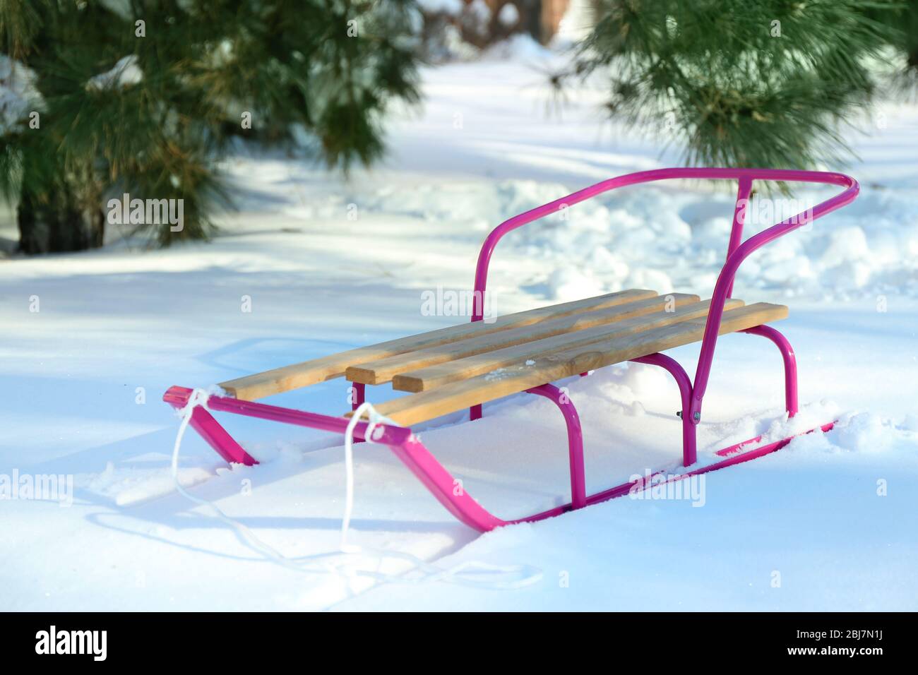 Wooden sled on snow, outdoor Stock Photo - Alamy