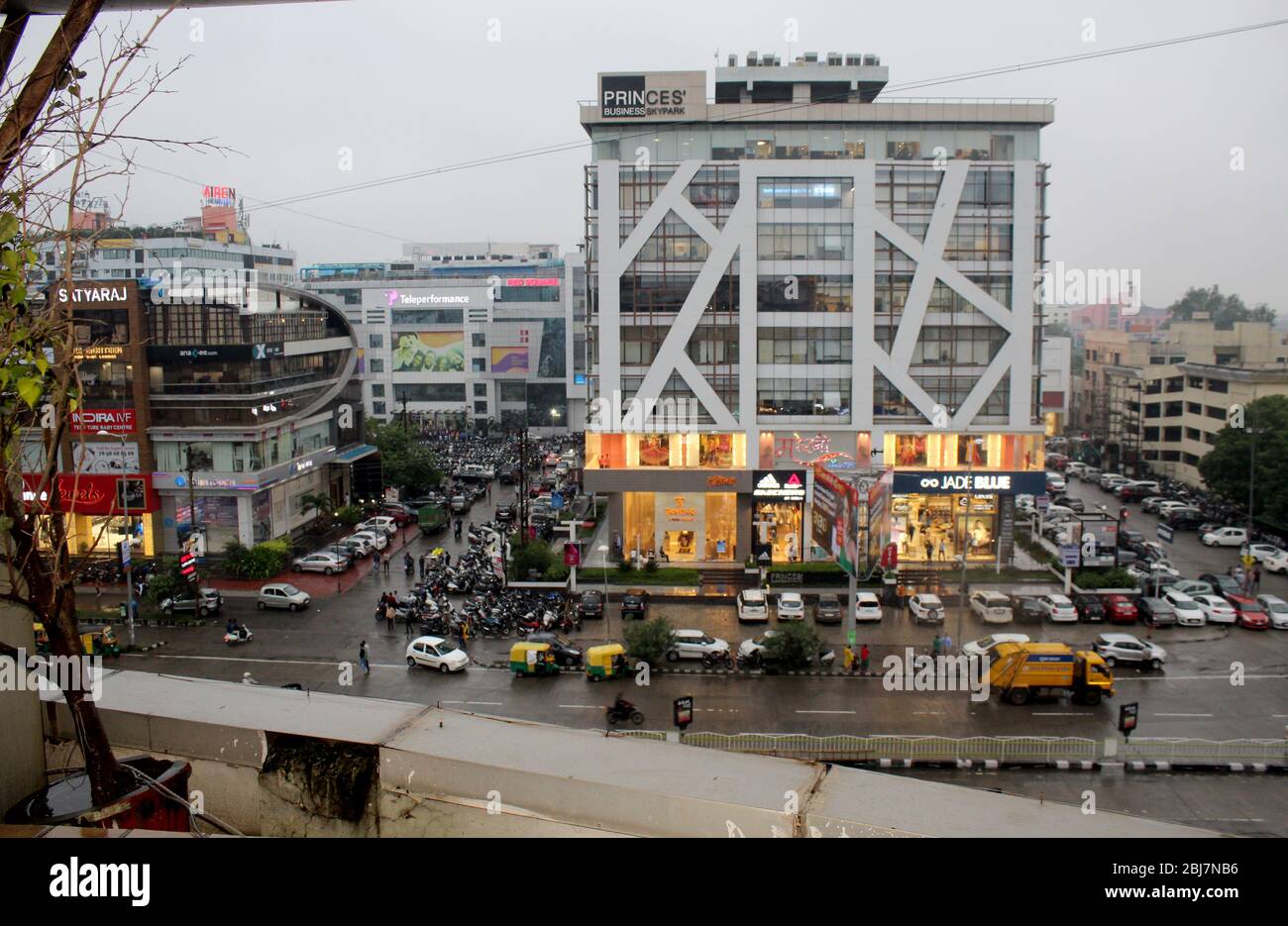 Top view of a developed city road traffic with vehicle, Indian town ...