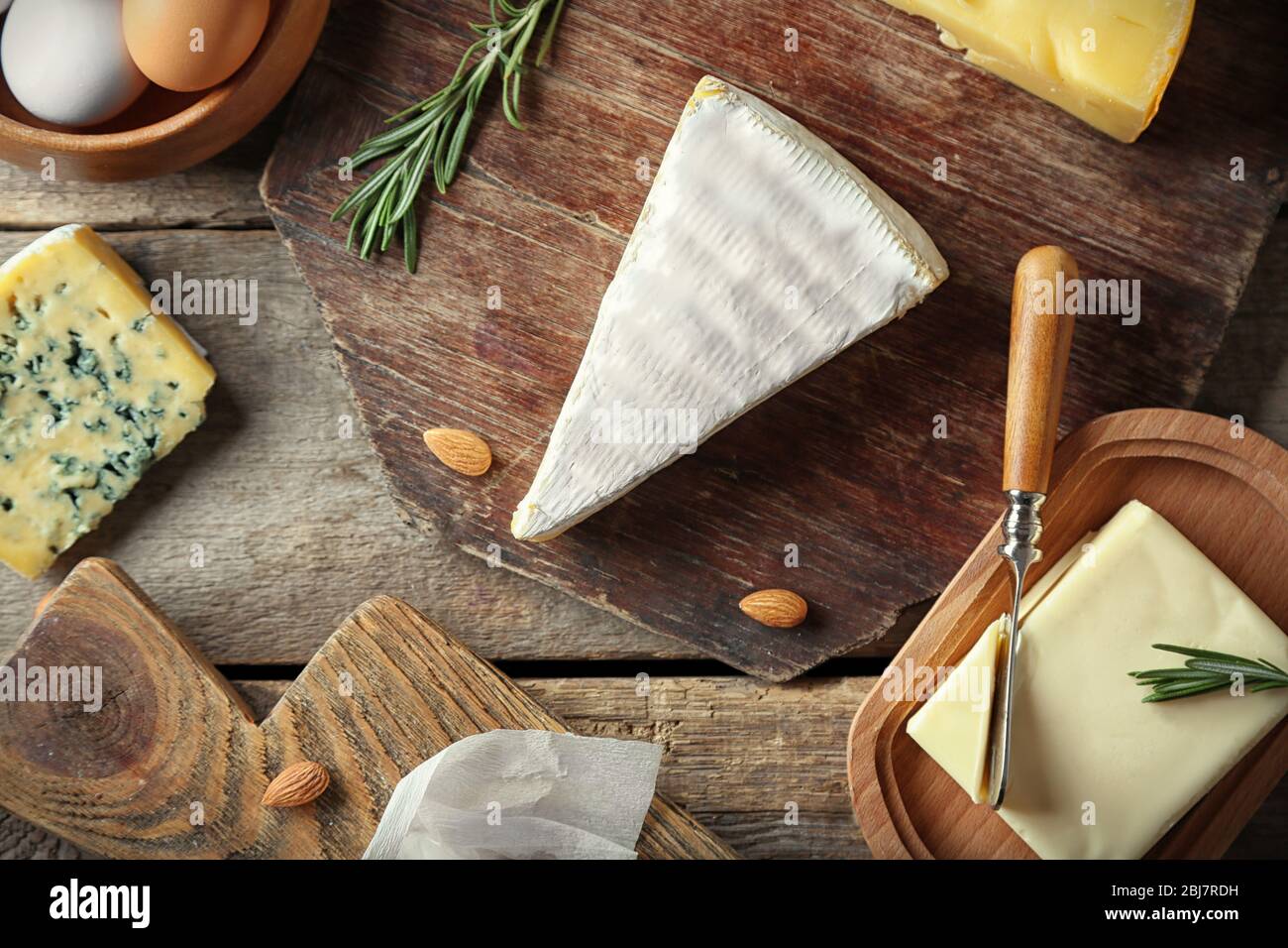 Set of dairy products on wooden table, top view Stock Photo - Alamy