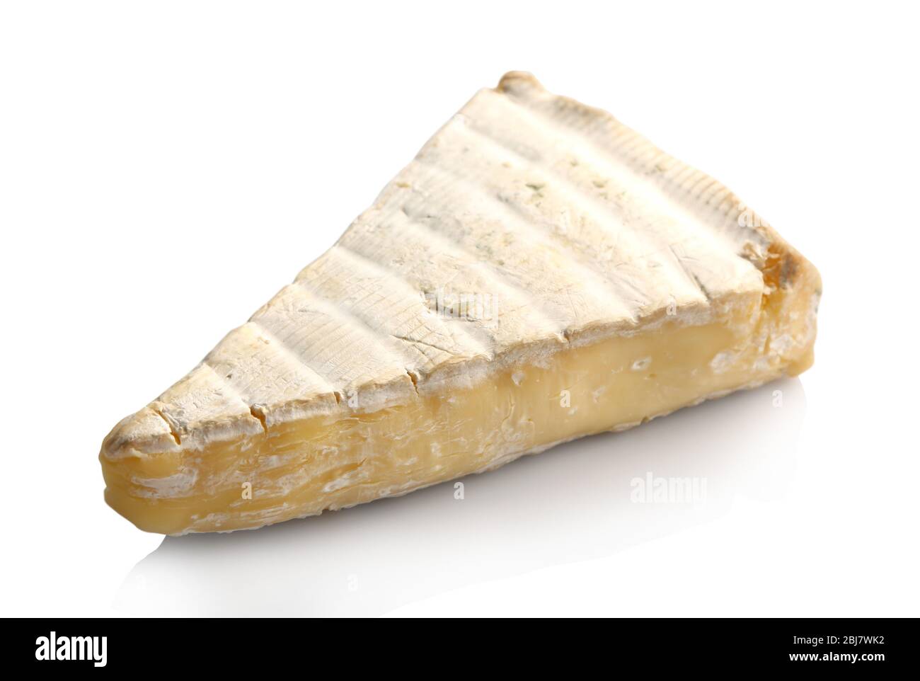 Camembert cheese in triangle shape isolated on white Stock Photo - Alamy