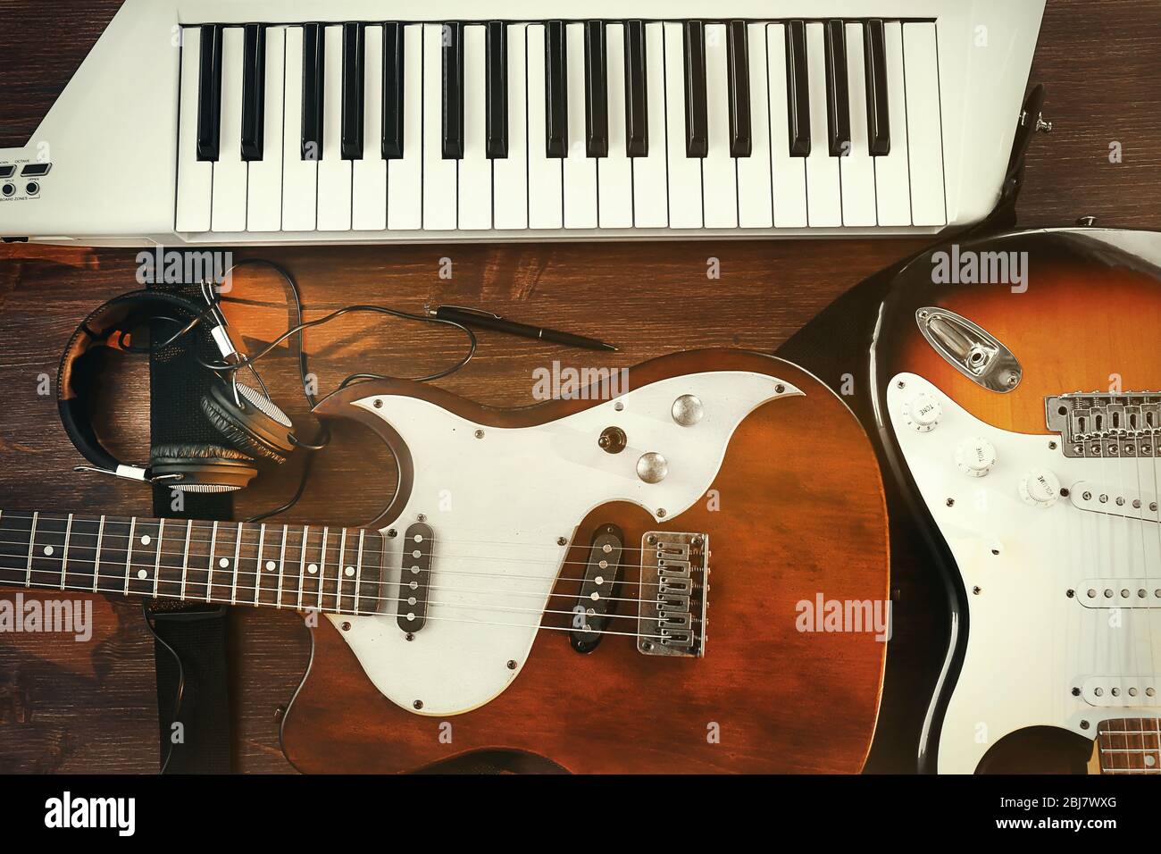 Electric guitars and synthesizer closeup Stock Photo - Alamy