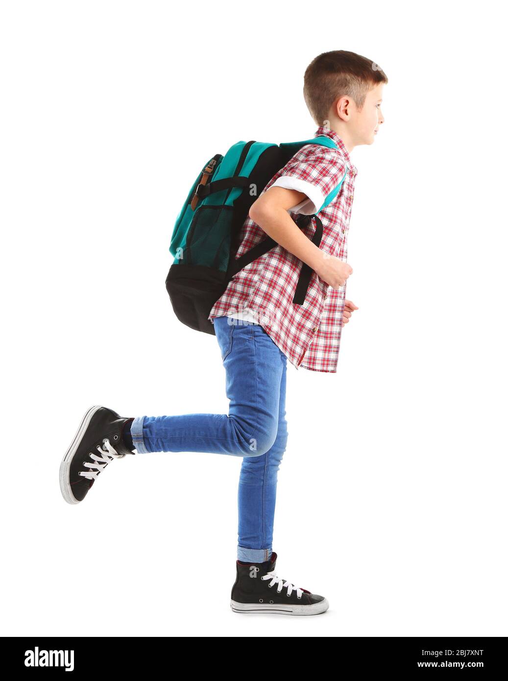 Little boy with back pack running right, isolated on white Stock Photo ...