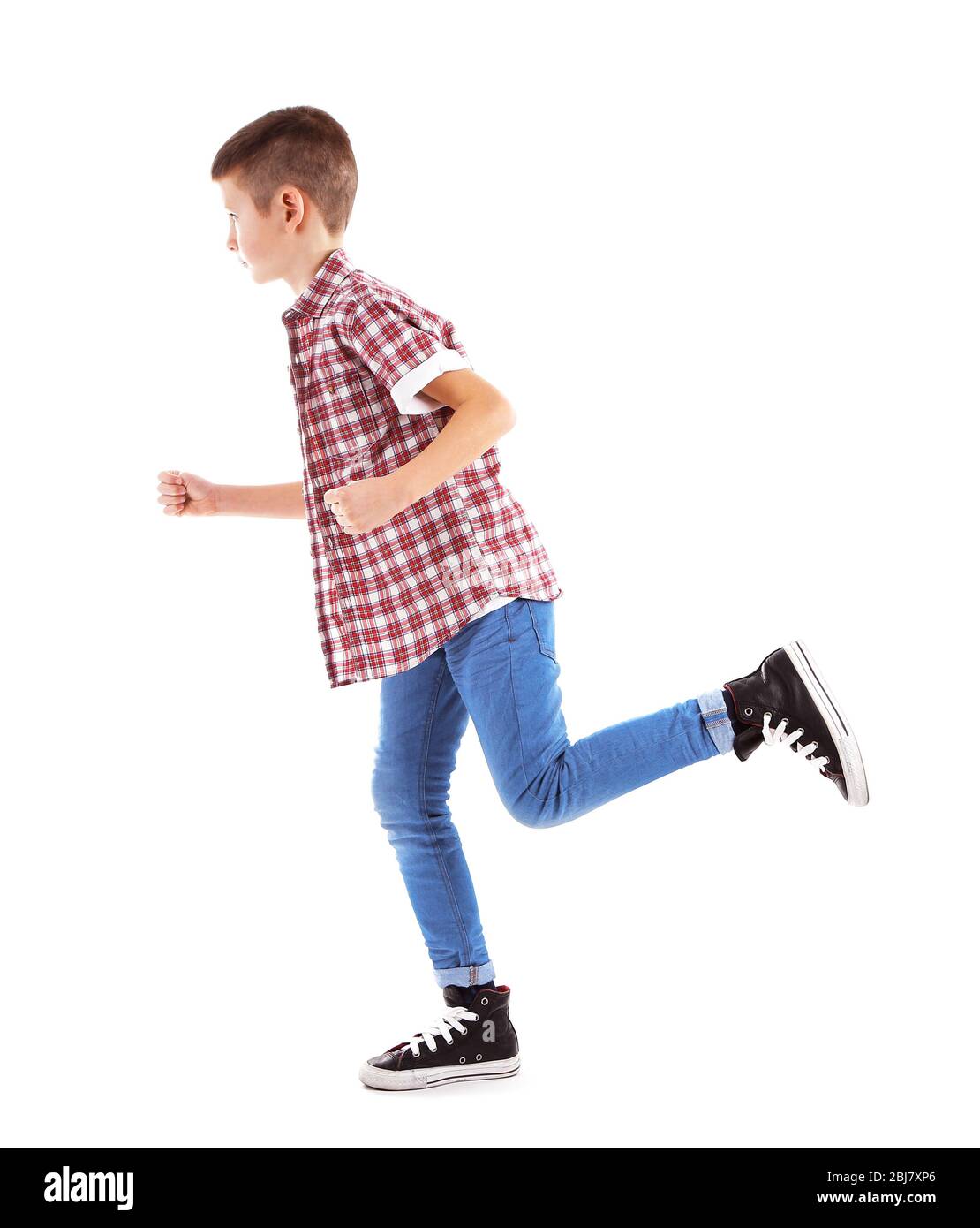 Little boy running left, isolated on white Stock Photo - Alamy