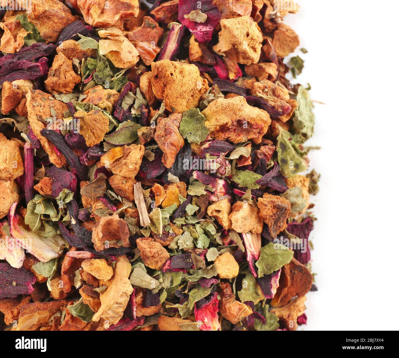 Mix of dry tea, fruits and flower petals, isolated on white Stock Photo ...