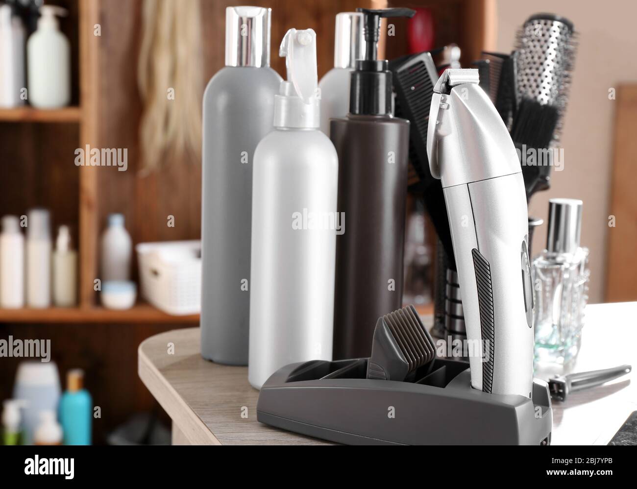 Professional hairdresser tools on table Stock Photo - Alamy