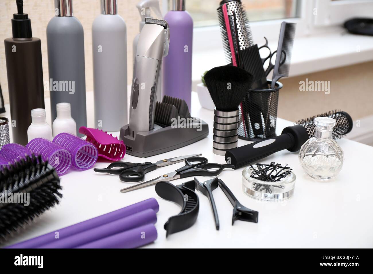 Professional hairdresser tools on table Stock Photo - Alamy