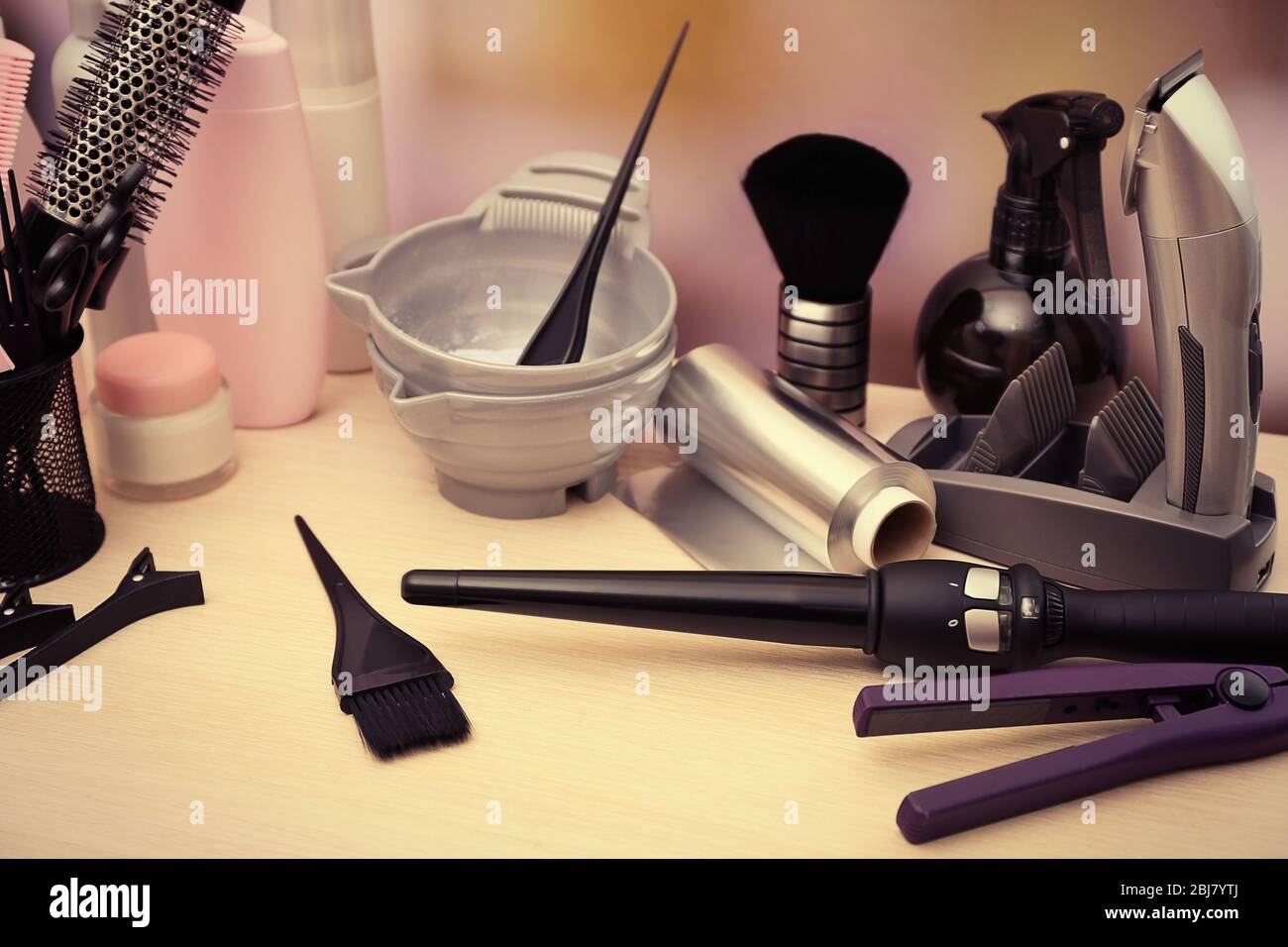 Professional hairdresser tools on table Stock Photo - Alamy