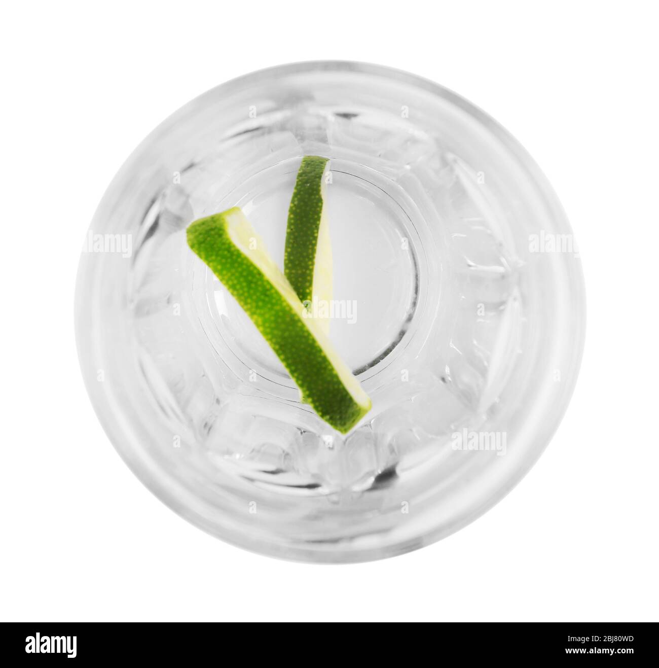Glass of water with lime slice isolated on white background, top view ...