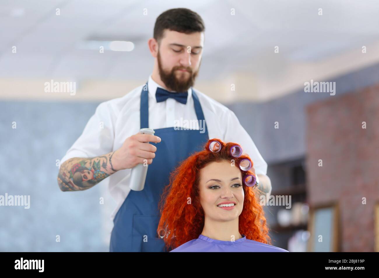 Beautiful hairdresser making man hi-res stock photography and images ...
