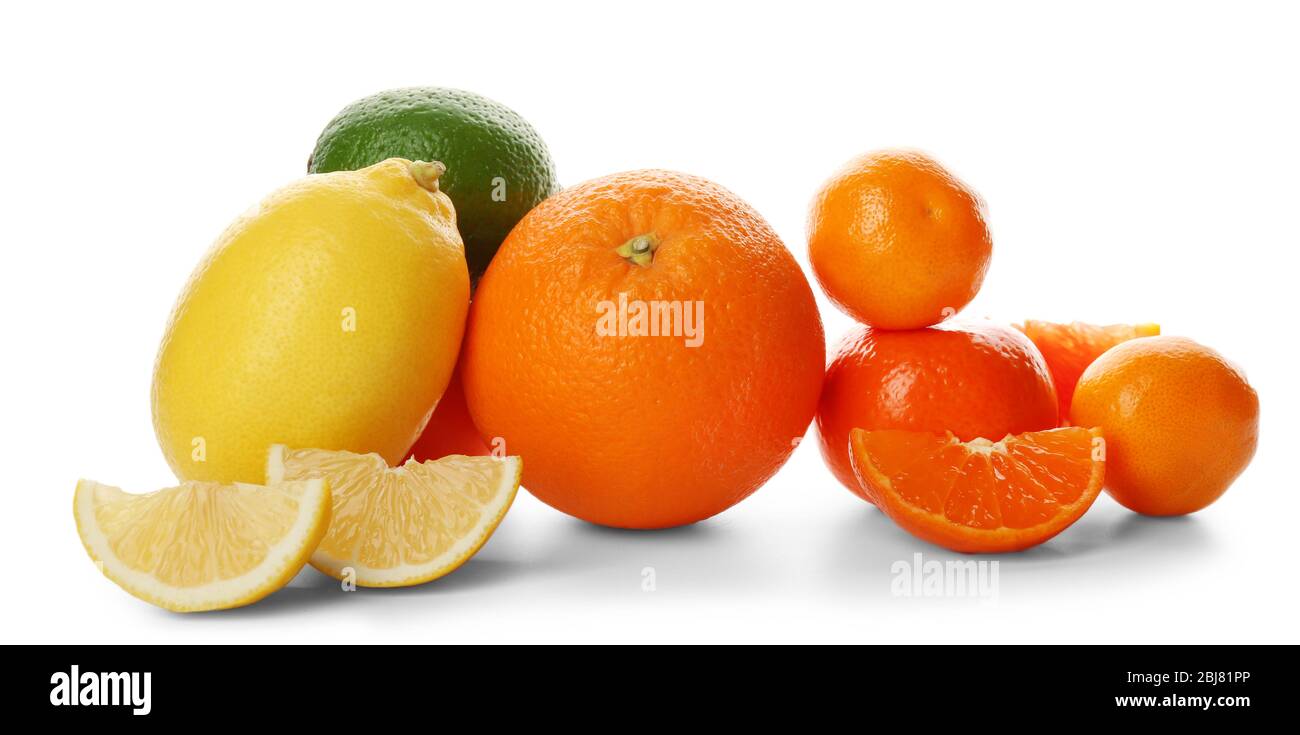 Mixed citrus fruit including lemon, lime, orange, tangerine and slices ...