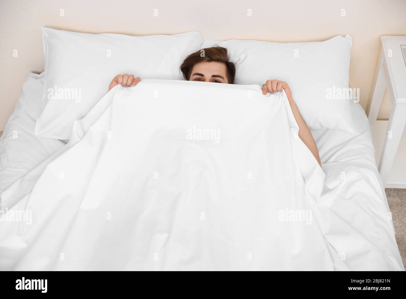 One man in bed funny hi-res stock photography and images - Alamy