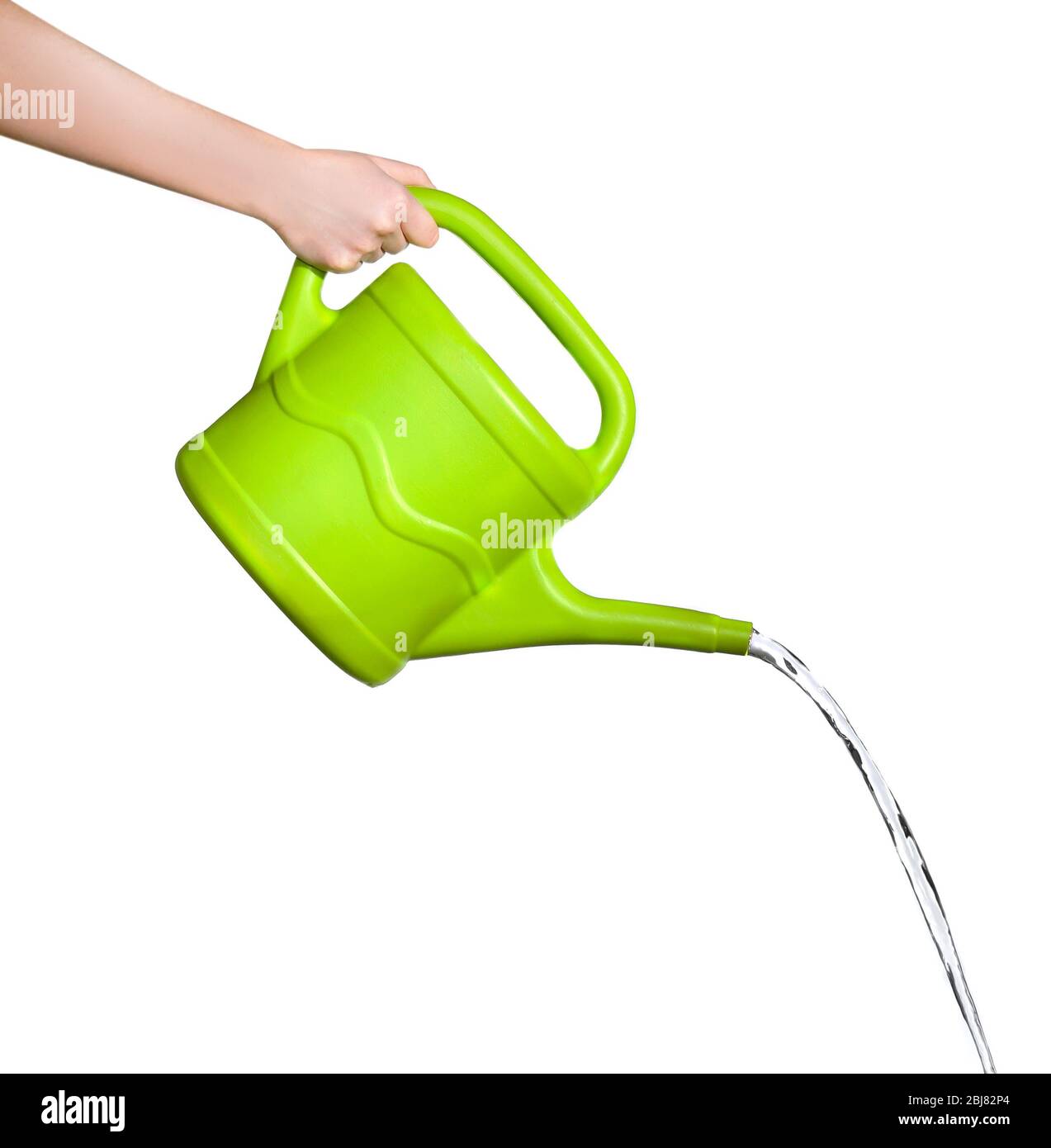 Female hand pouring water from green plastic watering can, isolated on ...
